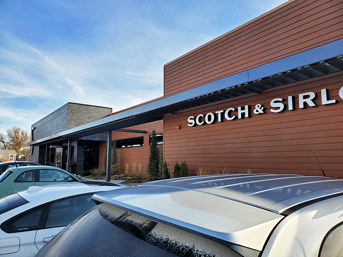 The iconic entrance to Scotch & Sirloin, where those stone lions aren't just guarding the door&mdash;they're keeping the vegetarians at bay.