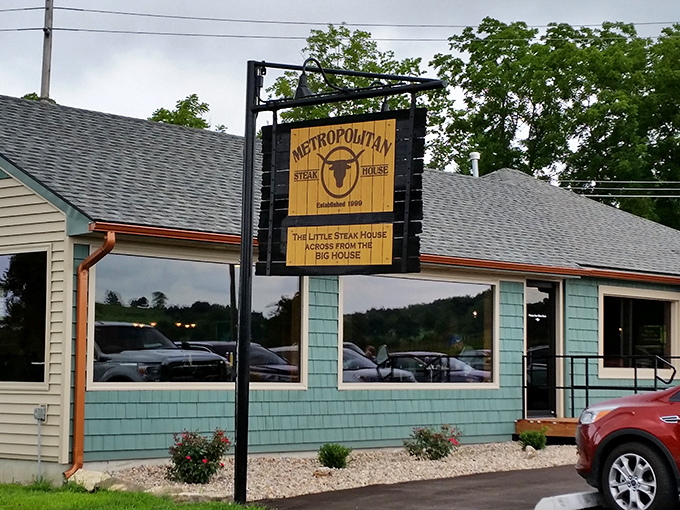 The little blue steakhouse with the big wooden sign says it all: "The Little Steak House Across From The Big House." Unpretentious perfection awaits.