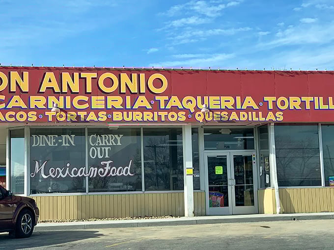 The yellow and red sign doesn't whisper, it announces: "Authentic Mexican food happens here!" No fancy marketing needed when the tacos speak for themselves.