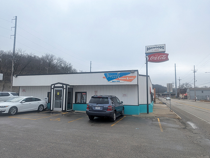 The unassuming white exterior of Dagwood's Cafe stands like a breakfast beacon against the Kansas sky, promising morning magic since 1938.