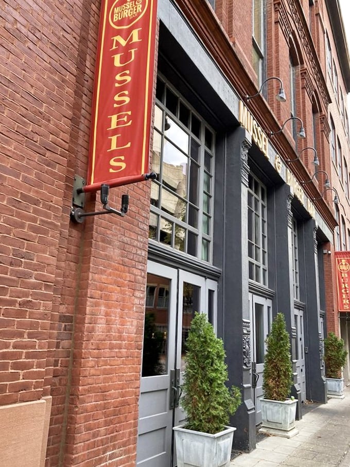 The unassuming exterior of Mussel & Burger Bar beckons like a siren song to burger lovers across Kentucky. Those columns aren't just holding up the roof&mdash;they're supporting culinary dreams.