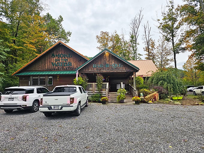 The rustic cabin exterior of Smoke on the Water beckons like a barbecue beacon in the West Virginia hills. That aroma you're smelling? Worth the drive alone.