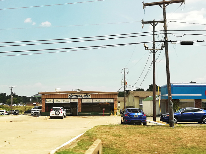 The unassuming brick facade of Southern Maid Donuts stands as a testament that greatness doesn't need flashy advertising—just decades of donut perfection.
