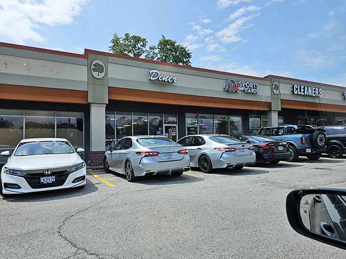 The modest exterior belies the breakfast paradise within. Like finding a treasure map in your attic, this unassuming storefront holds golden culinary rewards inside.