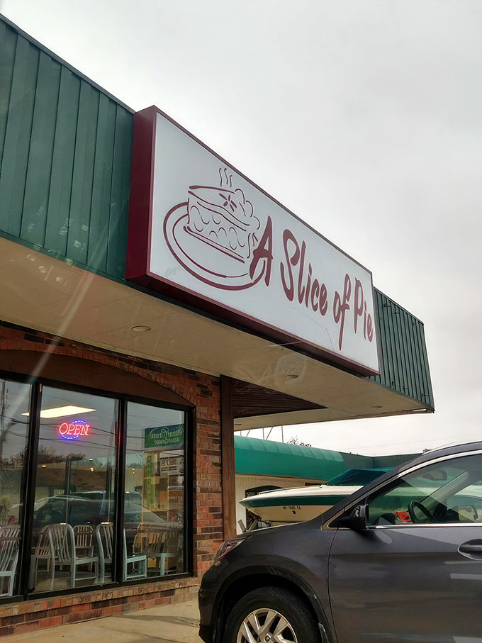 The unassuming storefront of A Slice of Pie belies the culinary magic happening inside. Like finding treasure in a strip mall. 