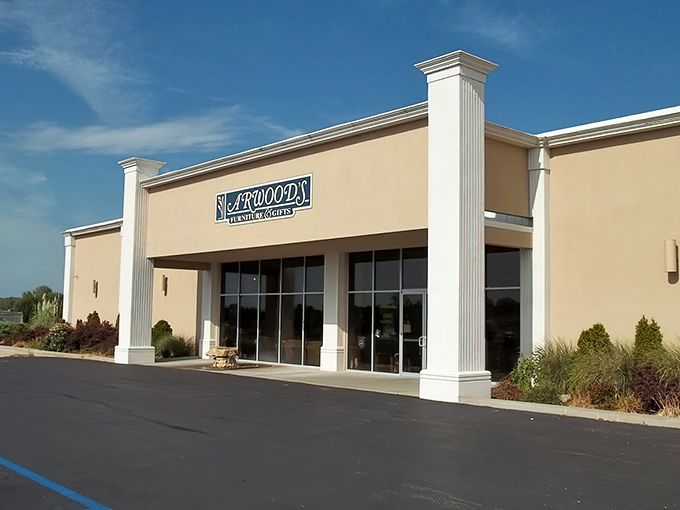 The unassuming exterior of Arwood's Furniture & Mattress hides a wonderland within, like finding a five-star restaurant in a gas station.