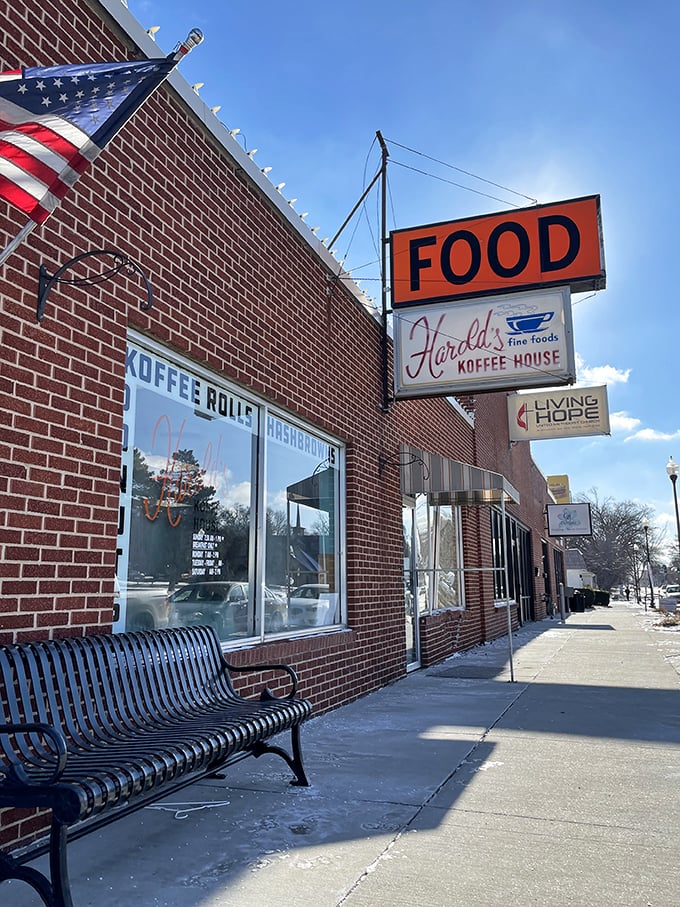 The iconic orange "FOOD" sign has been guiding hungry Nebraskans to Harold's Koffee House for generations, a beacon of comfort in Florence's historic district.