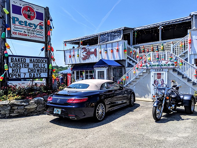 The stairway to seafood heaven! Petey's distinctive white exterior with colorful buoys promises maritime delights before you even step inside.