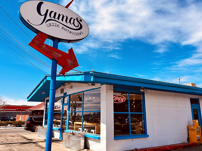 The blue-trimmed exterior of Yamas stands out like a Mediterranean oasis in Santa Fe, complete with that can't-miss red arrow guiding hungry travelers home.