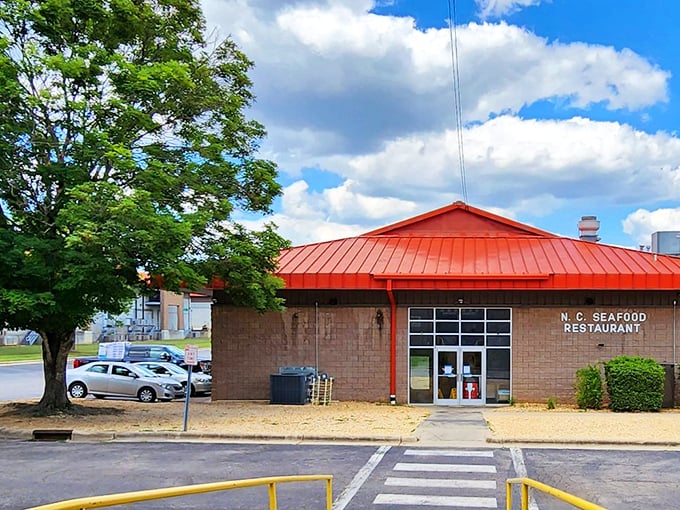 The unassuming exterior of N.C. Seafood Restaurant stands as a beacon for seafood lovers&mdash;architectural flair takes a backseat to what really matters: the food inside. 