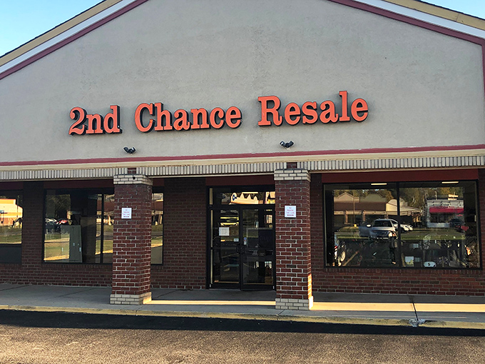The bright red signage of 2nd Chance Resale beckons like a lighthouse for bargain hunters navigating the sea of retail sameness.