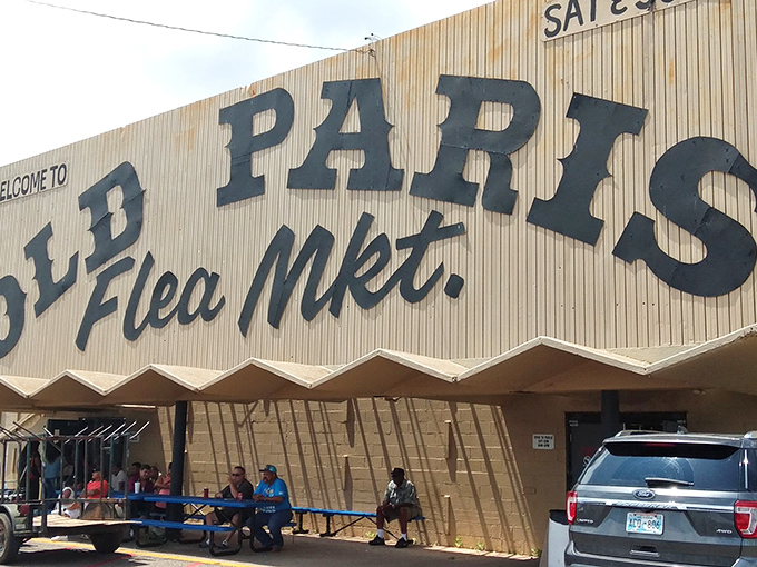 The iconic blue sign beckons treasure hunters like a siren call. Oklahoma City's Old Paris Flea Market promises adventures that no online shopping cart can deliver.