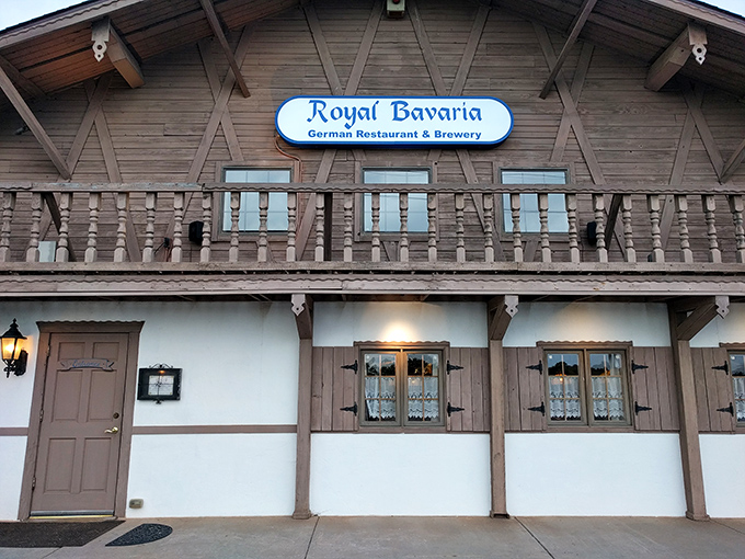 Bavaria meets Oklahoma in this charming Alpine-style exterior. The white stucco and dark wooden beams promise authentic German delights within.