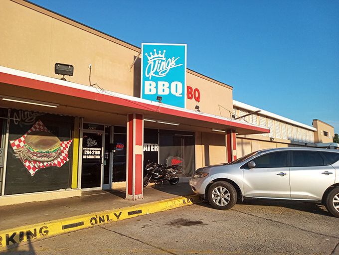 The blue crown sign beckons like a barbecue lighthouse. At King's, they don't need fancy exteriors when what's inside speaks volumes.