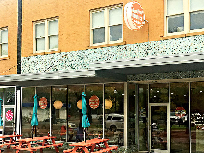 The cheerful yellow exterior with teal accents isn't just eye-catching&mdash;it's a morning beacon for carb enthusiasts across Oklahoma City.