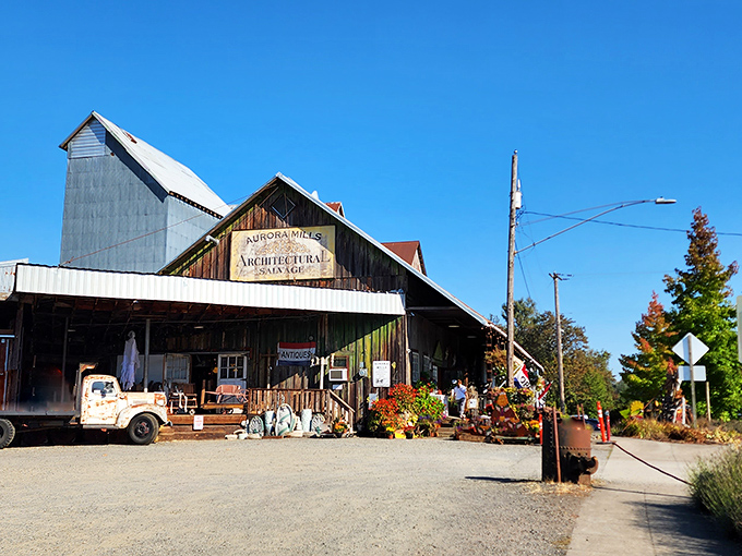 The rustic barn exterior of Aurora Mills beckons like a siren song to vintage lovers. Halloween cobwebs add seasonal charm to this already magical treasure trove.