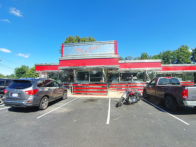 The classic roadside silhouette of Route 61 Diner stands against an autumn sky, beckoning hungry travelers like a neon-lit lighthouse for the famished.
