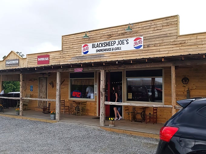 The weathered wooden exterior of Blacksheep BBQ isn't trying to impress anyone&mdash;until that hickory aroma hits you and changes everything.