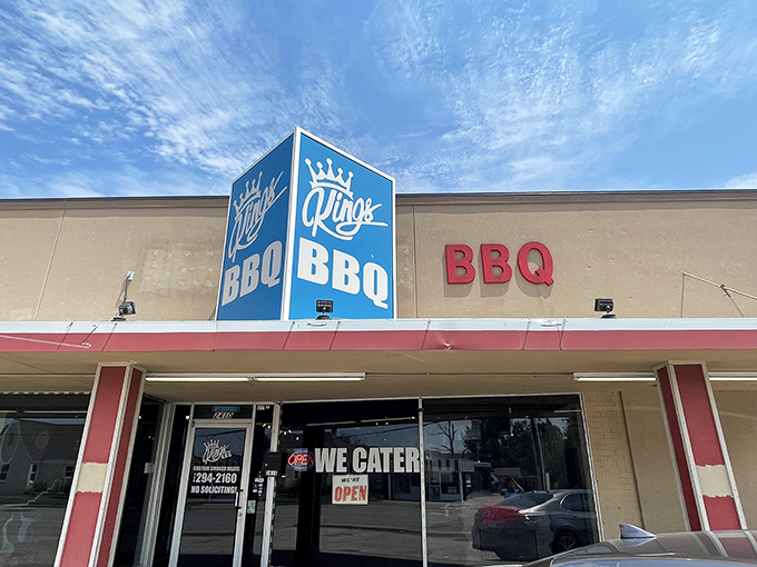 The blue crown sign beckons like a barbecue lighthouse. At King's, they don't need fancy exteriors when what's inside speaks volumes.