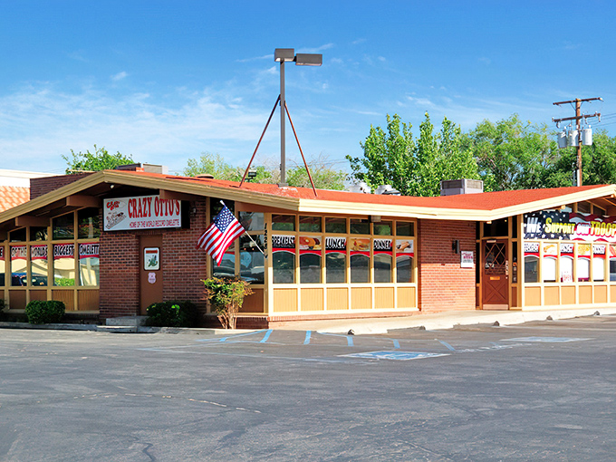 Patriotism meets pancakes at Crazy Otto's exterior. The "We Support Our TROOPS" banner reminds us that good diners are community cornerstones.