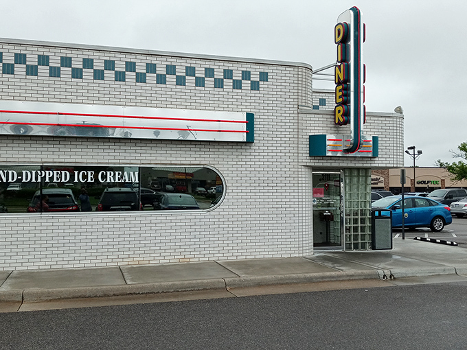 The classic black and white checkered exterior of Jimmie's Diner promises "BREAKFAST ALL DAY" &ndash; words that warm the soul like a hug from grandma.