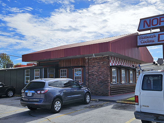 The iconic red exterior of Norma's Diner stands as a beacon of breakfast hope along Joplin's streets, promising homestyle cooking that's worth every mile of the journey.