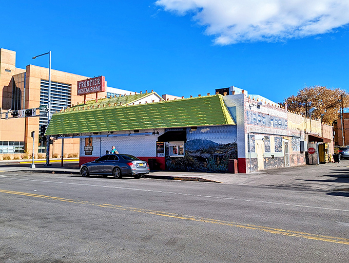 The iconic red-and-white facade of Frontier Restaurant stands as Albuquerque's culinary lighthouse, beckoning hungry souls from Central Avenue.