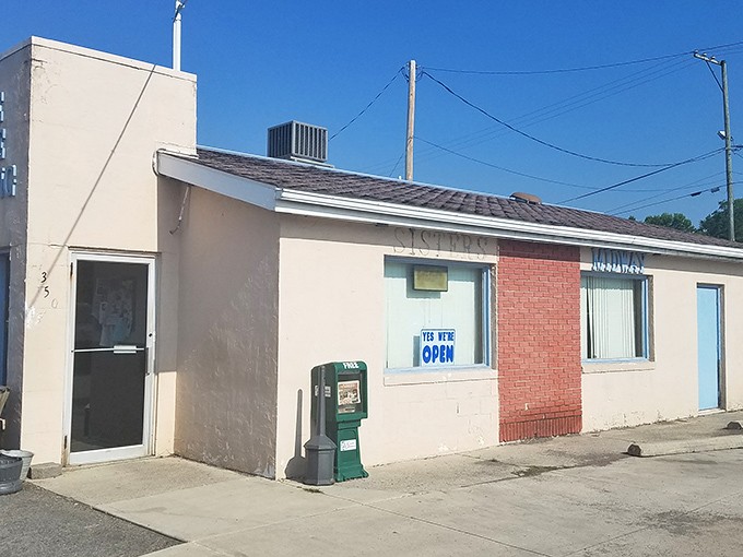The unassuming exterior of Midway Restaurant stands as a beacon of breakfast hope in Kenton, where culinary magic happens behind that modest fa&ccedil;ade.