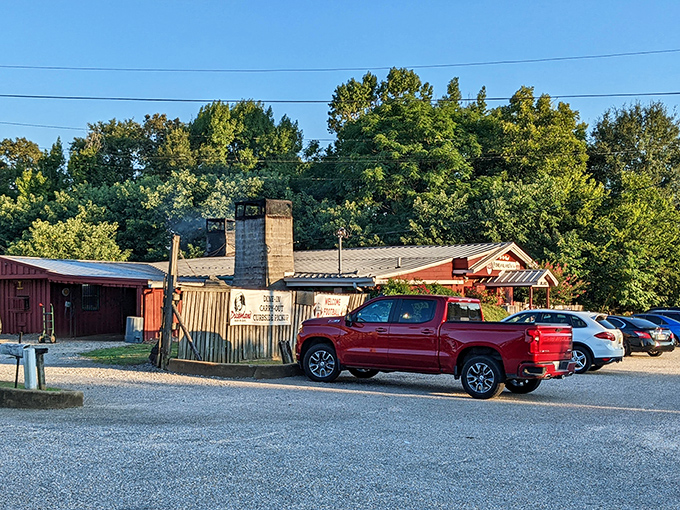 The unassuming red exterior of Dreamland BBQ stands like a barbecue beacon in Tuscaloosa. No fancy frills needed when what's inside speaks volumes through smoke signals.