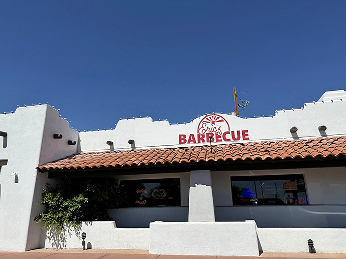 The white adobe exterior of Eric's Family Barbecue stands like a barbecue beacon against the Arizona sky, promising smoky treasures within.