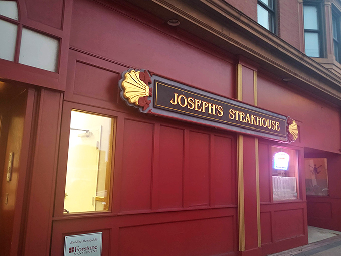 The unassuming brick fa&ccedil;ade of Joseph's Steakhouse hides culinary greatness like Clark Kent's glasses hide Superman. Classic signage promises old-school excellence. 