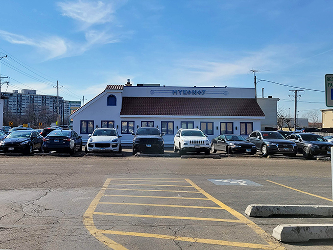 The white-washed exterior with blue trim makes Mykonos stand out in Niles like a Mediterranean postcard come to life. Greek island vibes without the airfare!