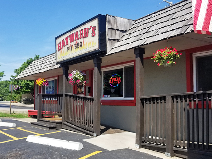 The American flag waves proudly outside Hayward's, as if to say, "The pursuit of happiness includes perfectly smoked ribs." Classic Kansas BBQ patriotism at its finest.