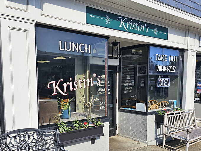 The inviting storefront of Kristin's promises breakfast paradise with its charming navy umbrellas and Early Bird Special that might make you do a double-take at the wallet-friendly prices.