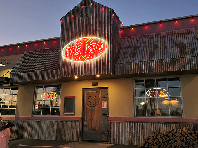 That neon pig sign isn't just decoration&mdash;it's a beacon of hope for the barbecue-deprived, glowing like a meaty North Star in Boulder City's night sky.
