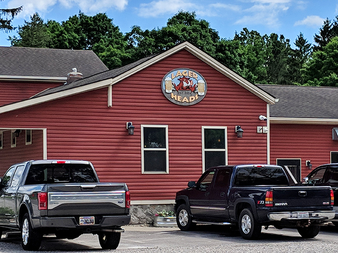 The red farmhouse beckons like a BBQ lighthouse on the Ohio horizon. Flower beds and rustic charm promise smoky delights within.