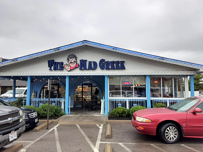 The blue-trimmed facade of The Mad Greek stands like a cheerful Santorini postcard dropped into Columbus. Greek hospitality awaits! 
