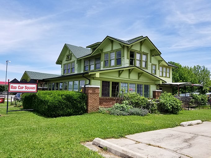 The mint-green craftsman house stands like a cheerful beacon of breakfast hope, promising plant-based delights inside its historic walls.