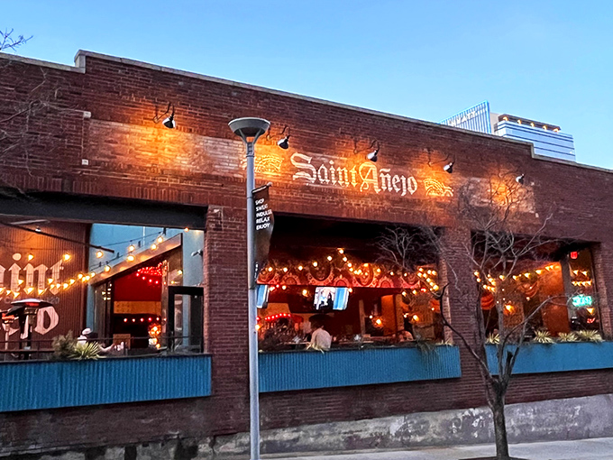 Saint Anejo's red brick exterior in Nashville's Gulch neighborhood promises culinary adventures within&mdash;like finding Mexico's soul in Tennessee's heart.
