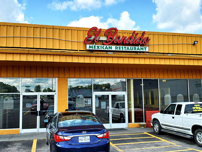The sunshine-yellow exterior of El Bandido stands out like a beacon of flavor in Oak Hill, promising authentic Mexican delights inside.