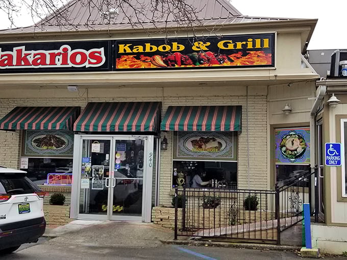 The Mediterranean promised land awaits! Makarios Kabob & Grill's inviting storefront in Birmingham beckons with its striped awnings and promise of authentic flavors.