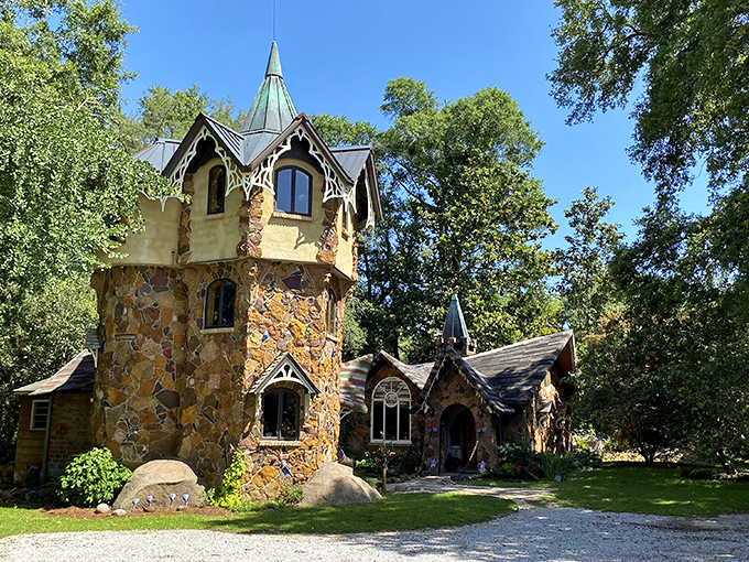 The stuff of fairy tales! This stone tower with its green conical roof rises from the Alabama woods like a magical sentinel guarding enchanted grounds.