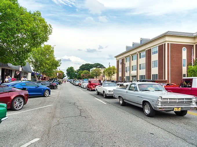 Vintage cars line Gadsden's Broad Street like a time-traveling car show, where yesterday's chrome beauties meet today's treasure hunters.