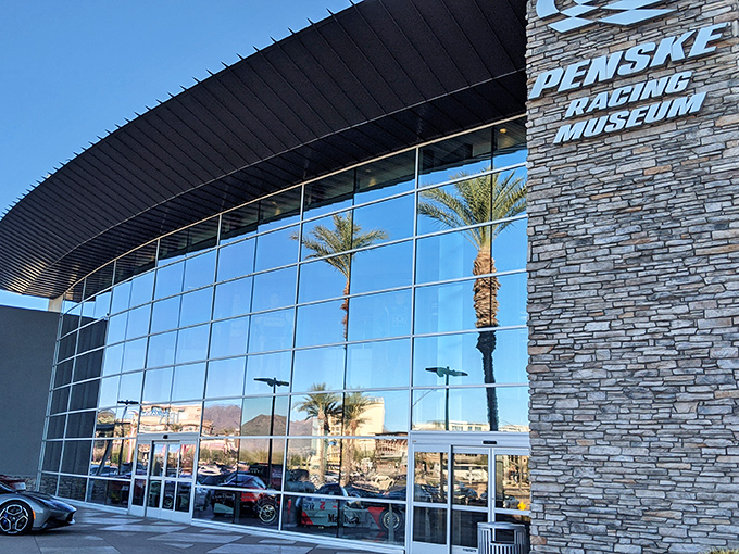 The sleek glass fa&ccedil;ade of Penske Racing Museum gleams in the Arizona sun, palm trees standing guard like pit crew members awaiting their champions.