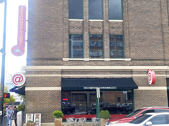 The iconic @ symbol beckons from this brick corner spot in downtown Little Rock, promising modern diner delights with a side of urban charm.