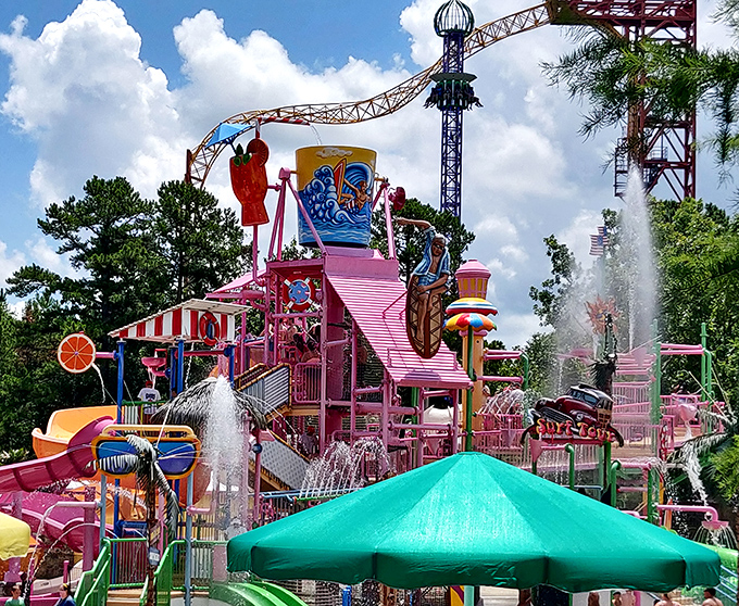 A kaleidoscope of water slides twists against the Arkansas sky, promising the perfect remedy for those "is this actually the surface of the sun?" summer days.