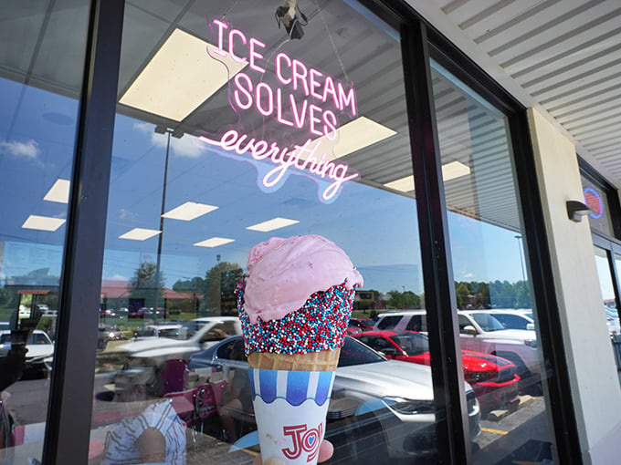 Scoops Homemade Ice Cream stands proudly in Hot Springs, its cheerful yellow facade promising sweet relief from Arkansas summer heat. The "OPEN" sign never looked so inviting.