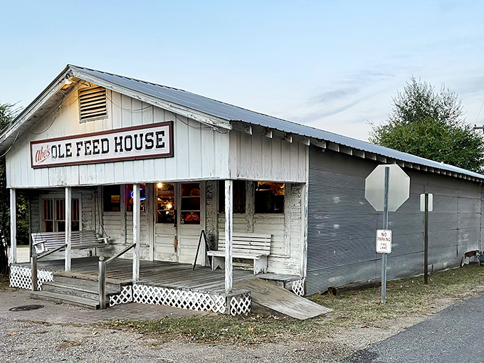 The unassuming exterior of Abe's Ole Feed House stands like a time capsule of Southern hospitality, complete with porch swing for pre-feast contemplation.