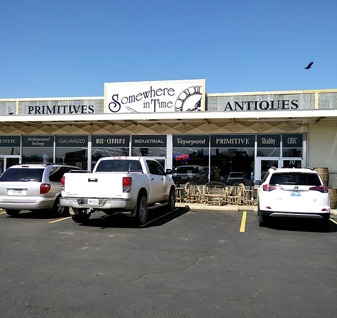 The unassuming storefront of Somewhere In Time beckons with promises of "PRIMITIVES" and "ANTIQUES" &ndash; a time portal disguised as a strip mall tenant.