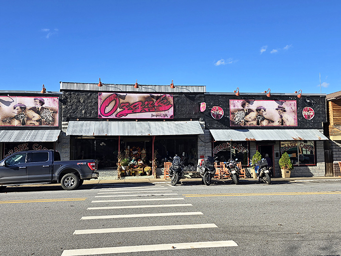 The classic facade of Ozark Cafe stands proudly on Jasper's main street, its vintage signage and Coca-Cola murals promising a time-traveling culinary adventure. 